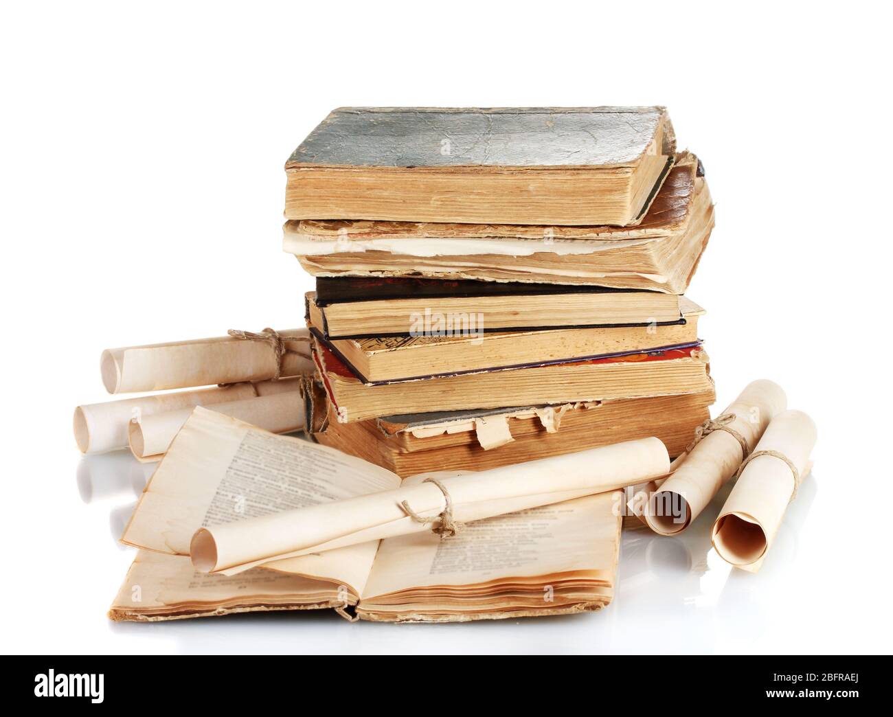 Pile of old books and scroll isolated on white Stock Photo - Alamy