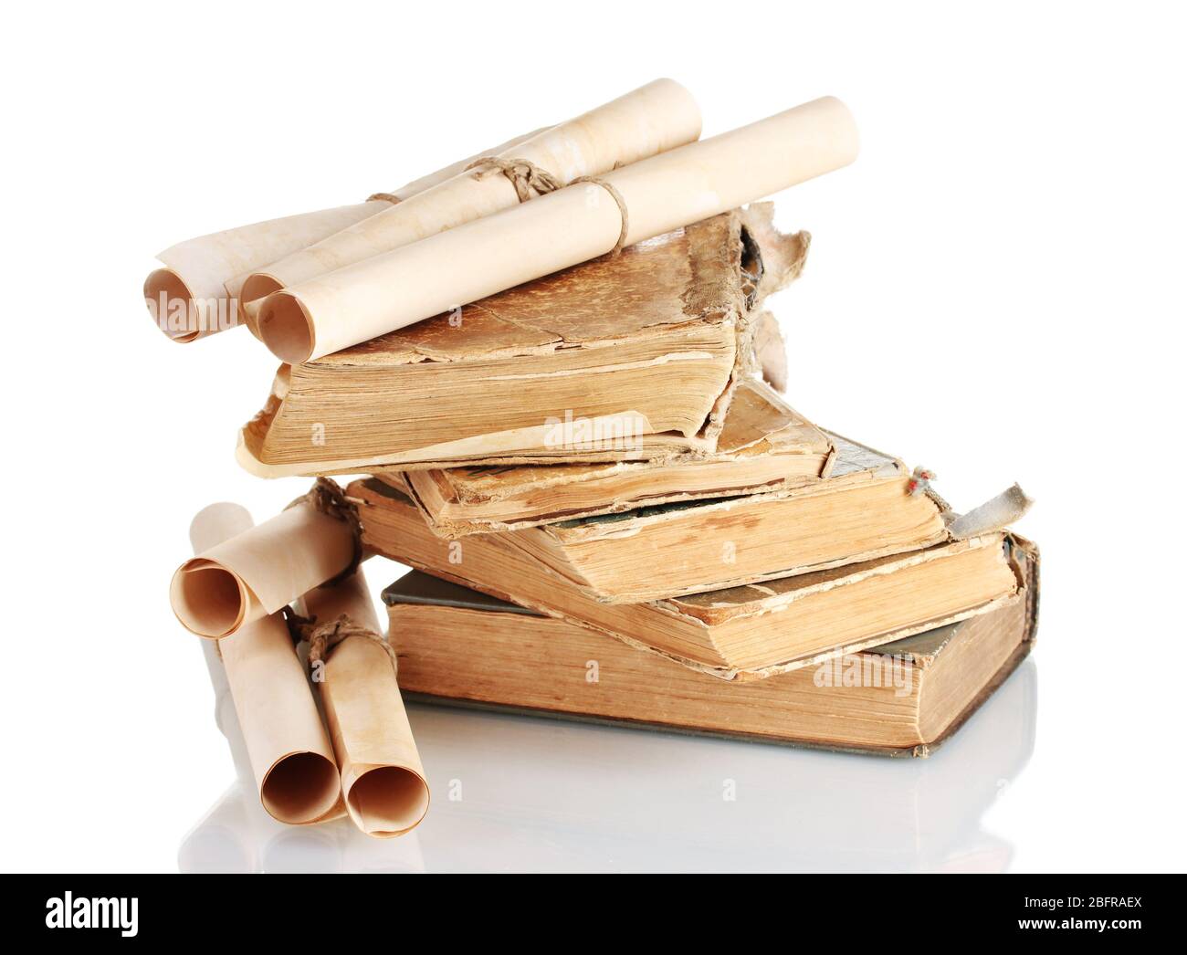 Pile of old books and scroll isolated on white Stock Photo - Alamy