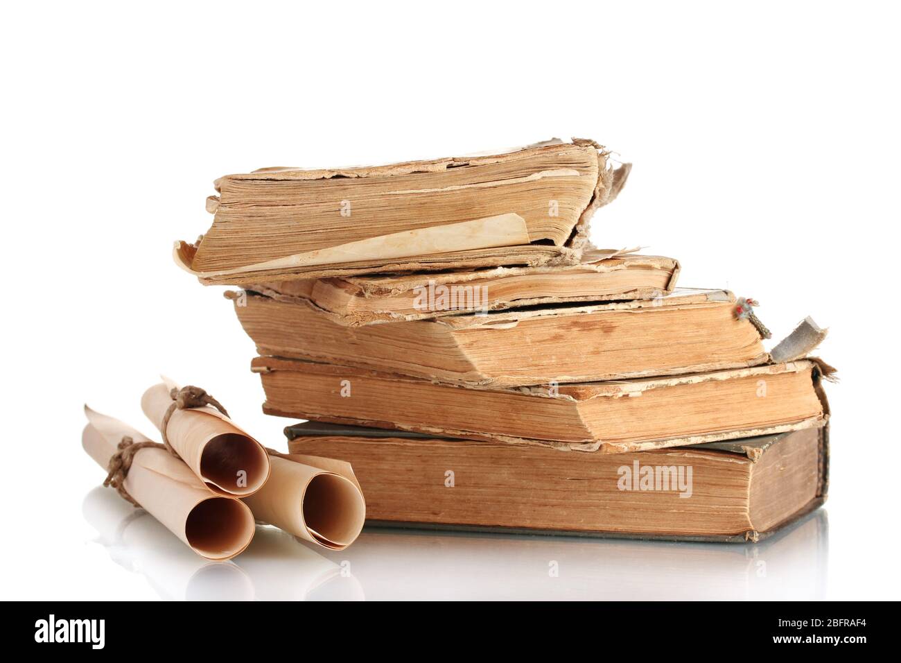 Pile of old books and scroll isolated on white Stock Photo - Alamy