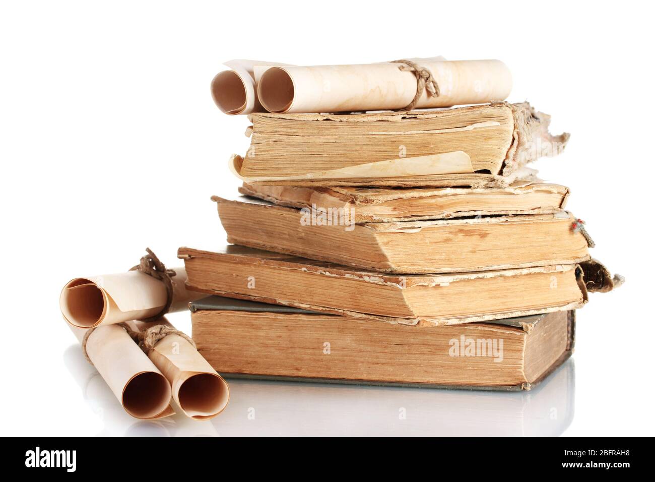 Pile of old books and scroll isolated on white Stock Photo - Alamy