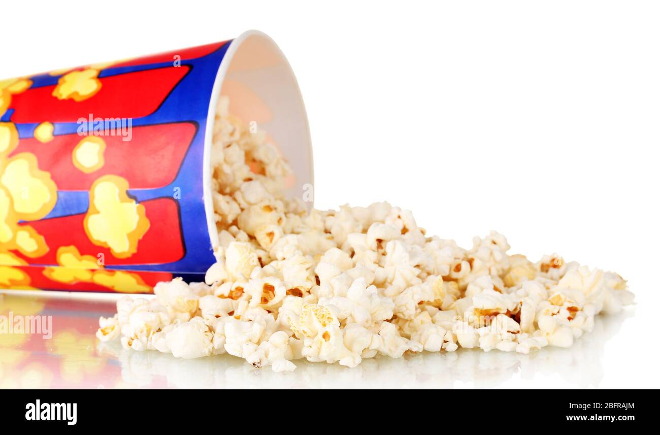 Full bucket of popcorn dropped isolated on white Stock Photo - Alamy