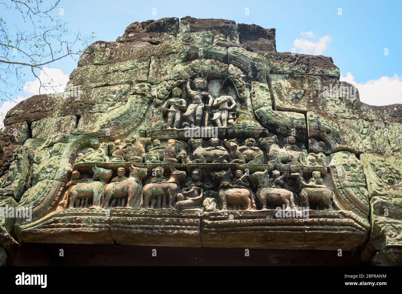 Carvings of demons and Apsara dancers from Hindu mythology on a door ...