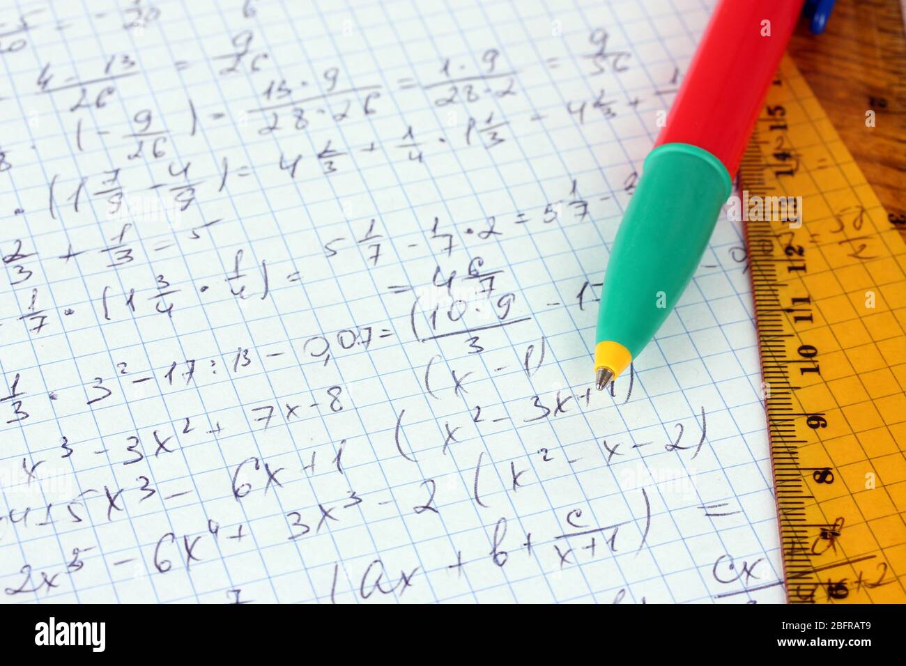 Math on copybook page closeup Stock Photo - Alamy