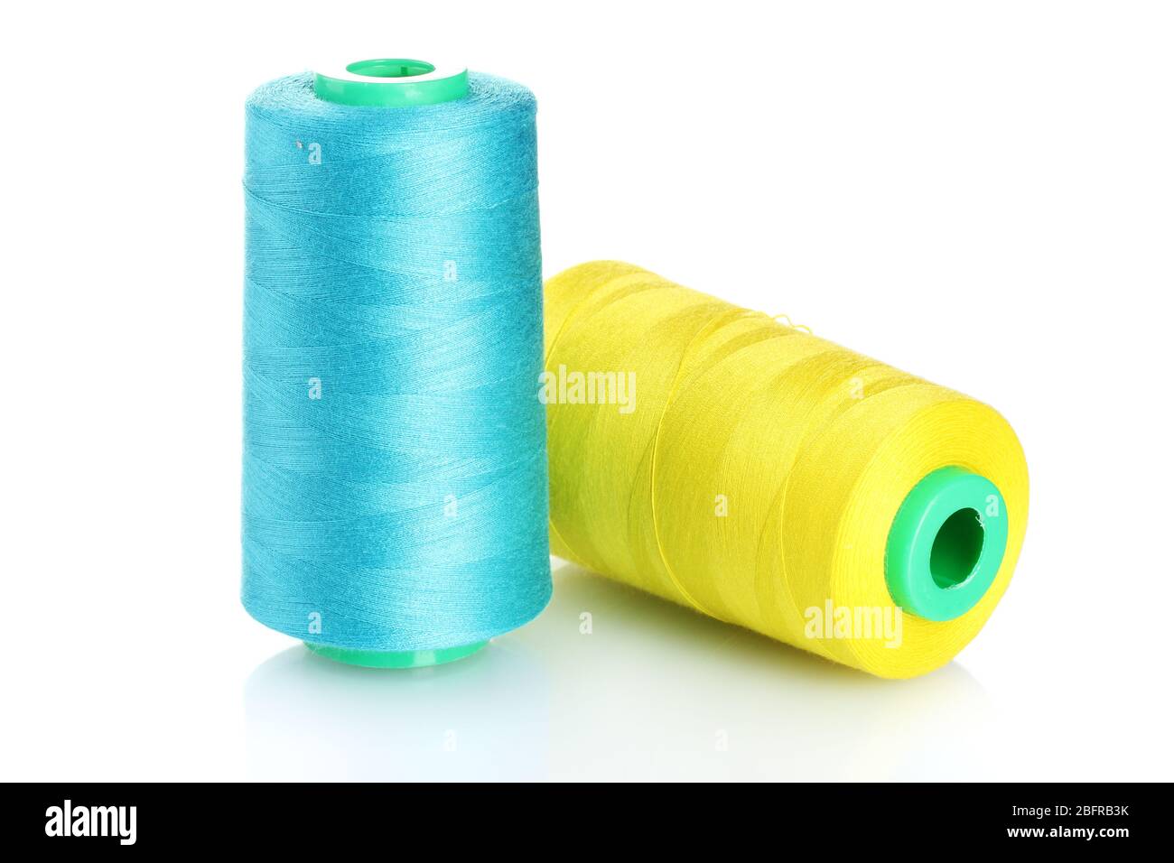 Bobbins of thread isolated on white Stock Photo - Alamy