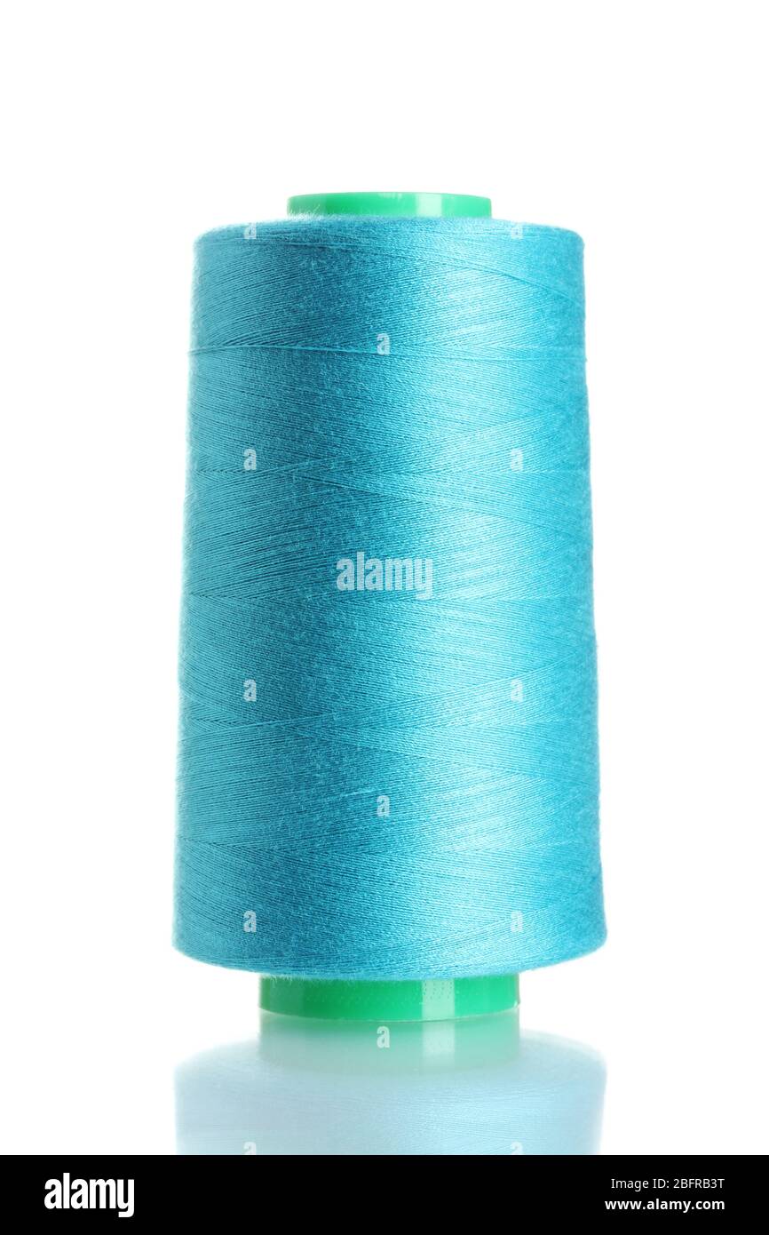 Blue bobbin thread isolated on white Stock Photo - Alamy