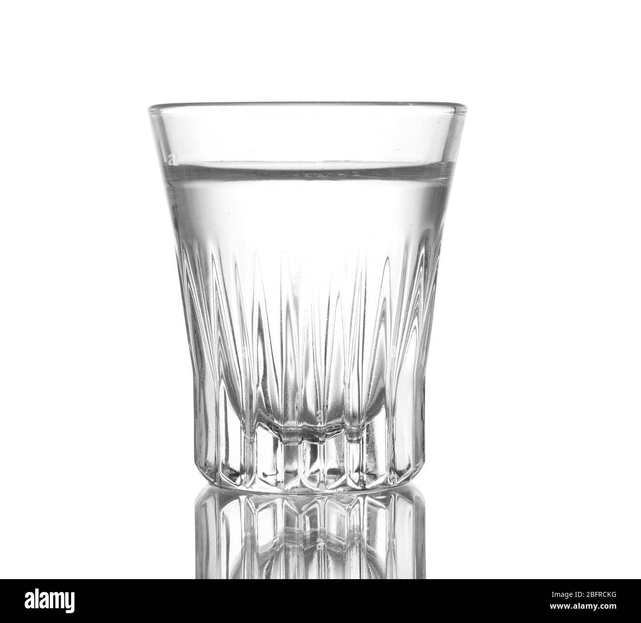 Glass of vodka isolated on white Stock Photo - Alamy