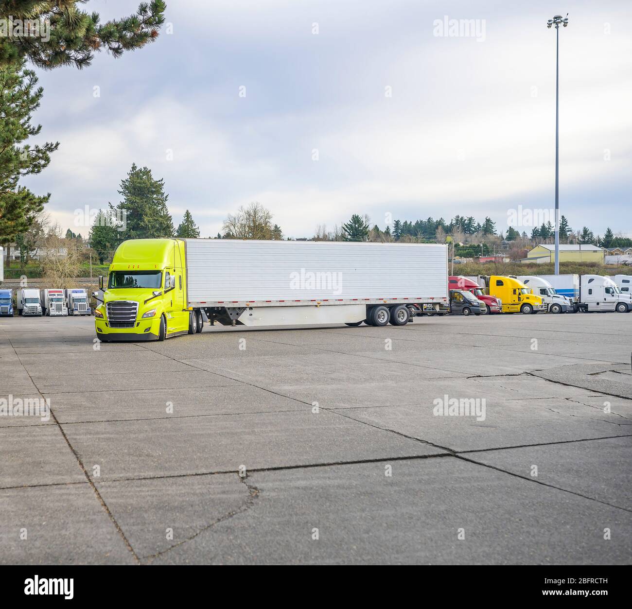 Yellow Big rig classic bonnet industrial diesel semi truck with ...