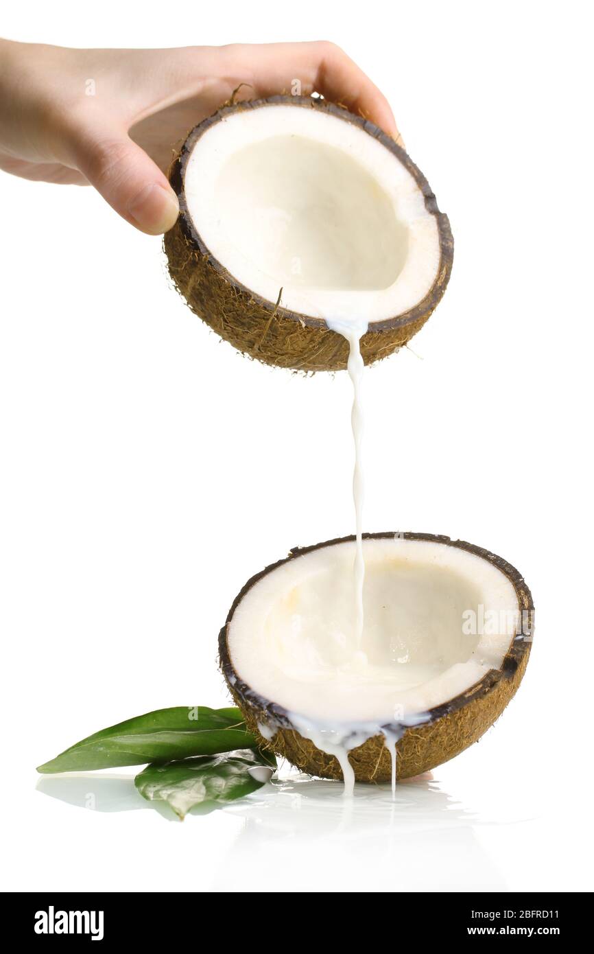 Coconut with coconut milk isolated on white Stock Photo - Alamy