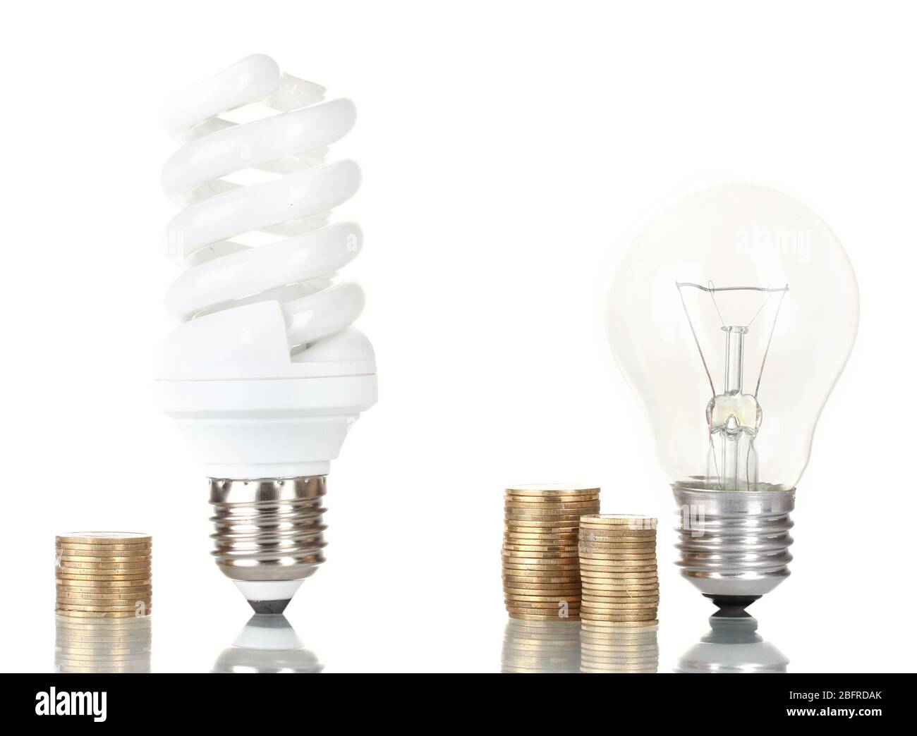 Comparison of ordinary light bulbs with energy saving lamp isolated on ...