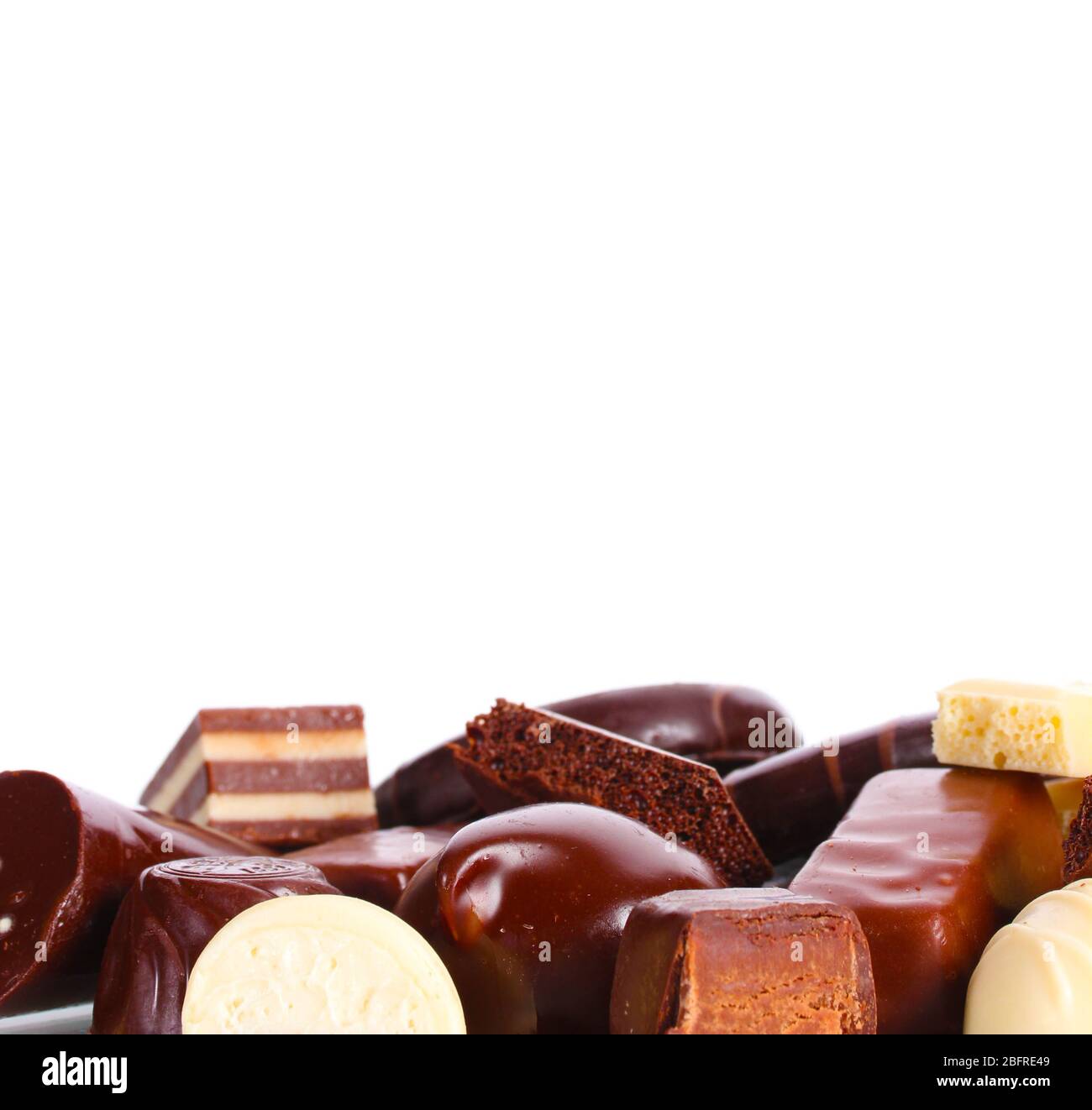 Many different chocolate candy isolated on white Stock Photo - Alamy