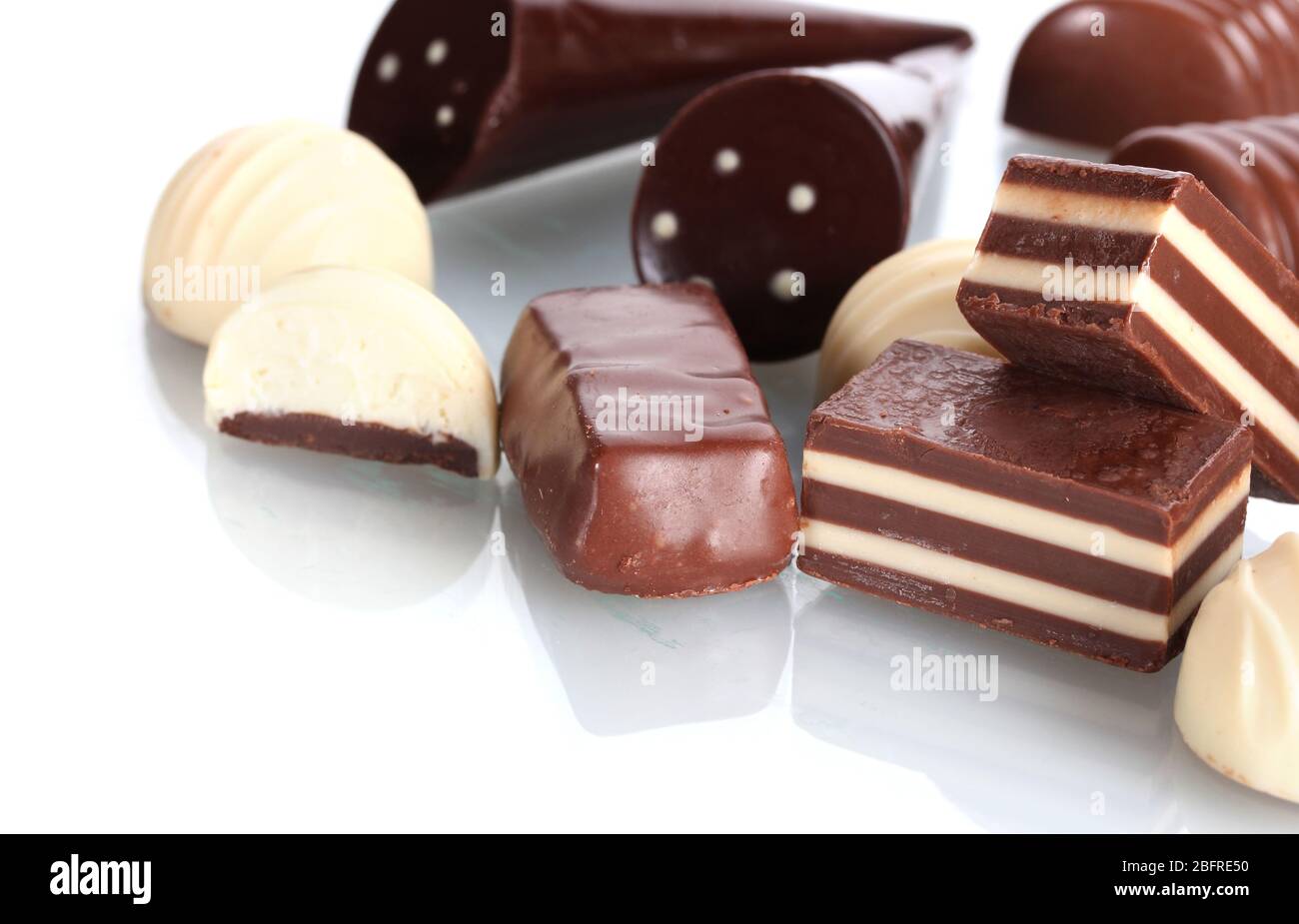 Many different chocolate candy isolated on white Stock Photo - Alamy