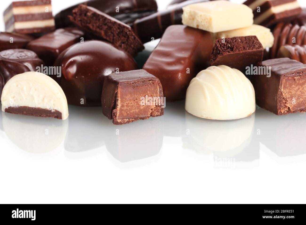 Many different chocolate candy isolated on white Stock Photo - Alamy