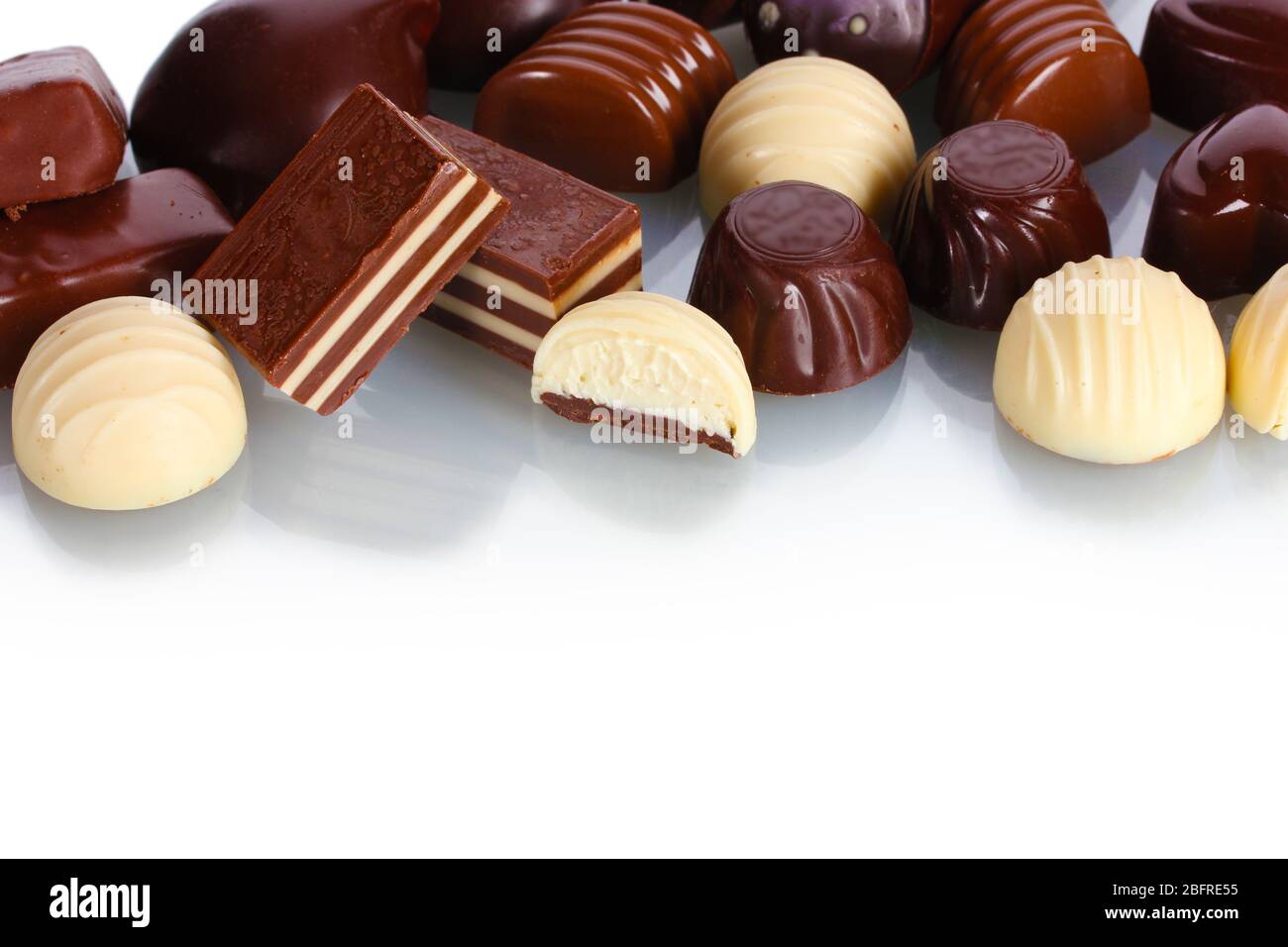 Many different chocolate candy isolated on white Stock Photo - Alamy
