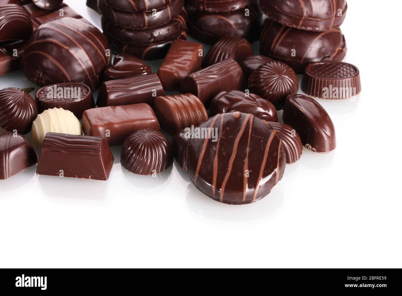 Many different chocolate candy isolated on white Stock Photo - Alamy