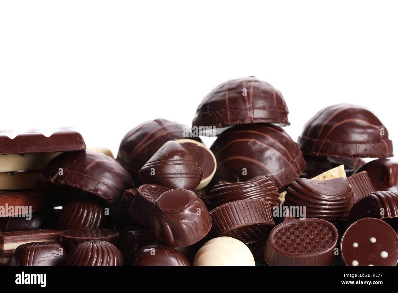Many different chocolate candy isolated on white Stock Photo - Alamy