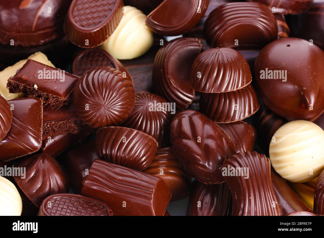 Many different chocolate candy closeup Stock Photo - Alamy