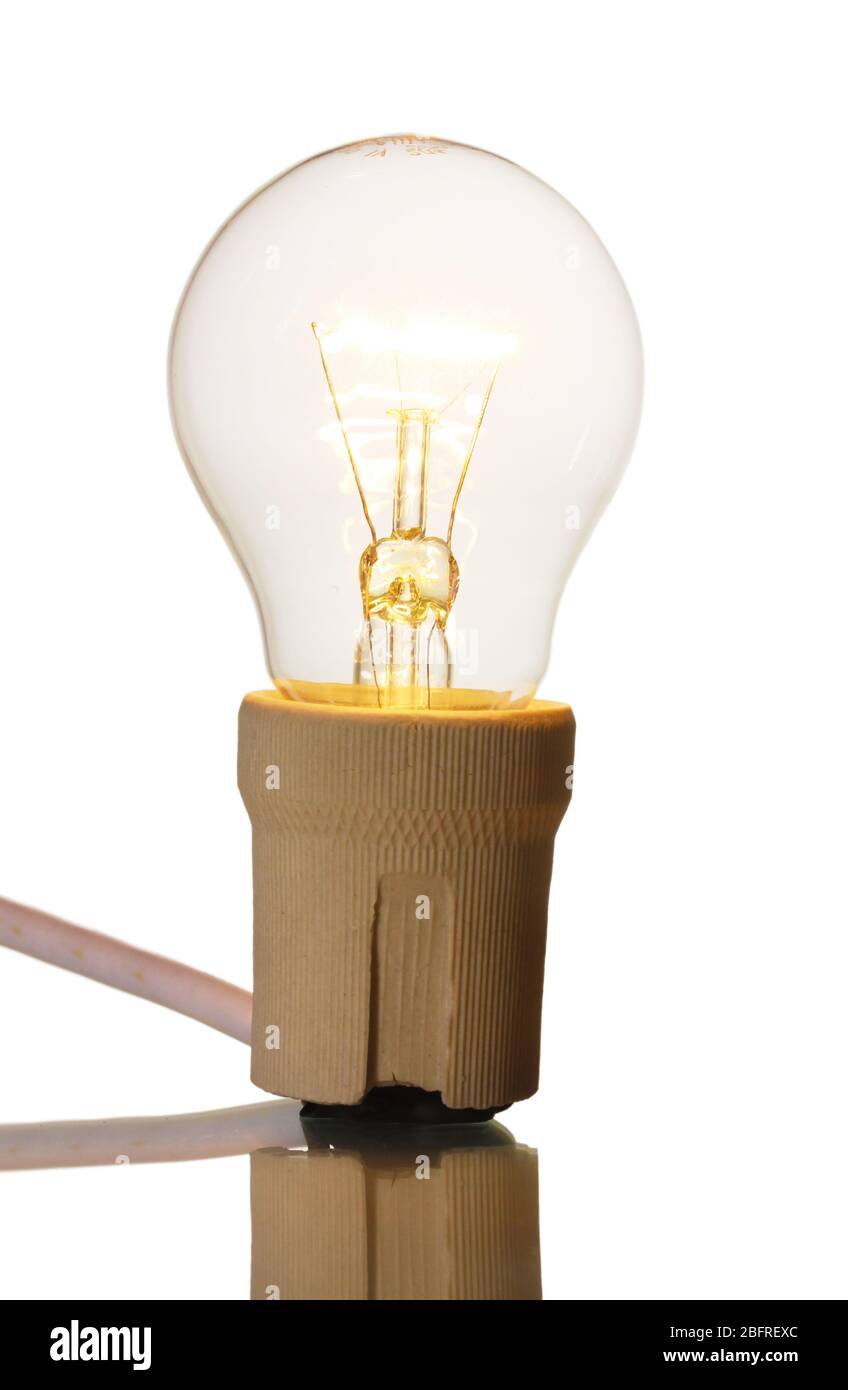 A lit light bulb isolated on white Stock Photo - Alamy