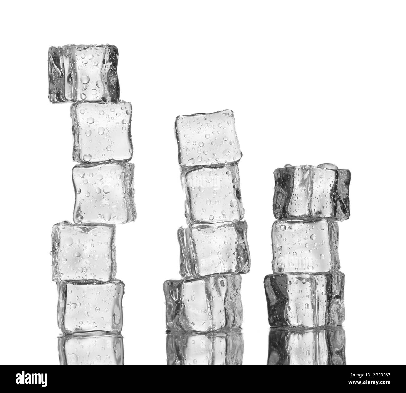 Melting ice cubes isolated on white Stock Photo - Alamy