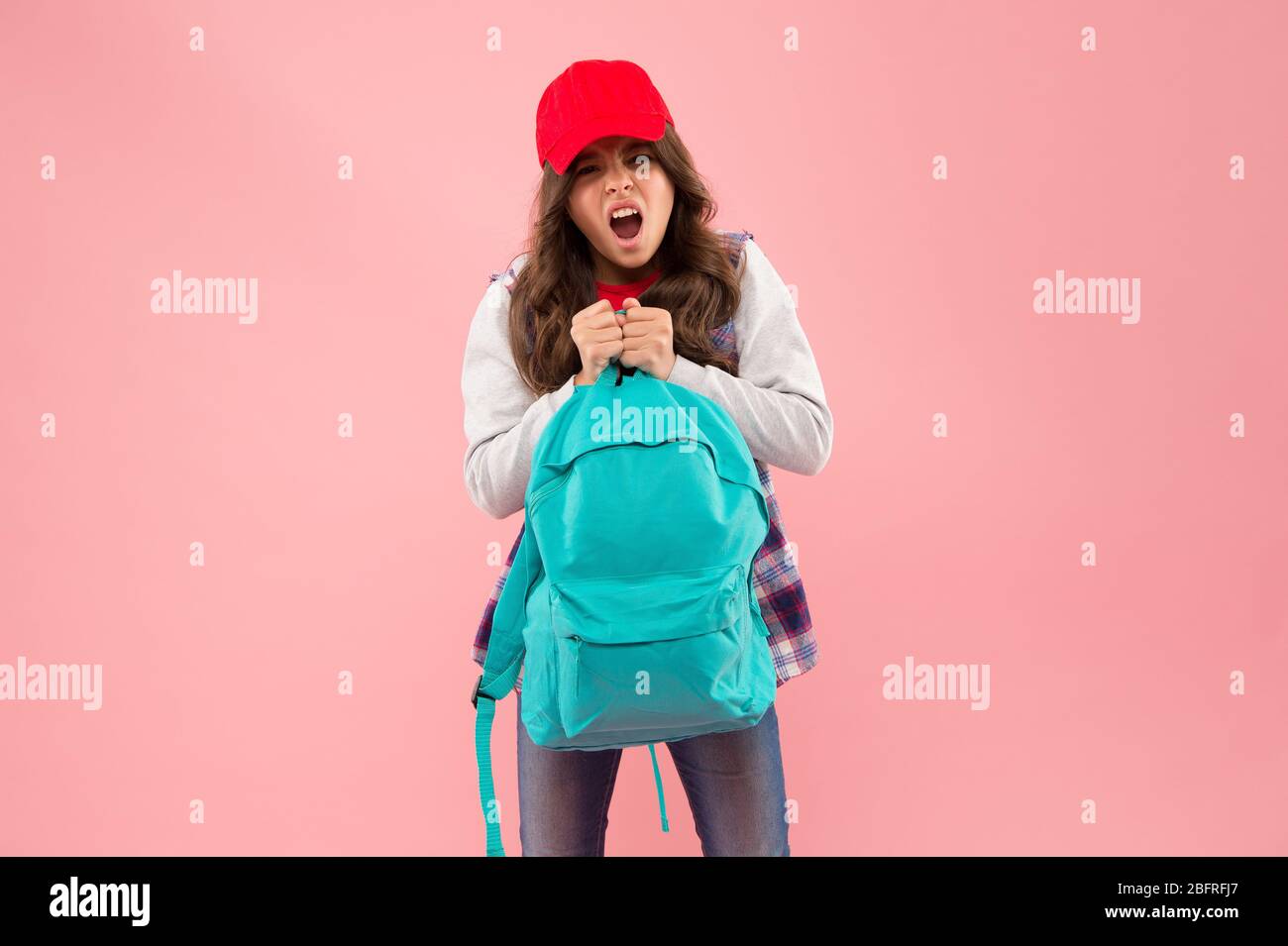 Too much knowledge. Little child carry heavy backpack. Back to school ...