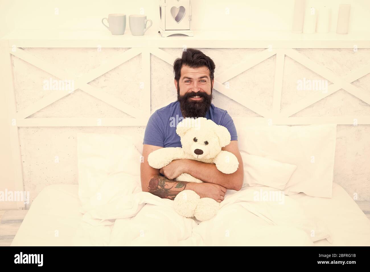 Cute and romantic. Bearded hipster play toy. Valentines day gift. Man ...