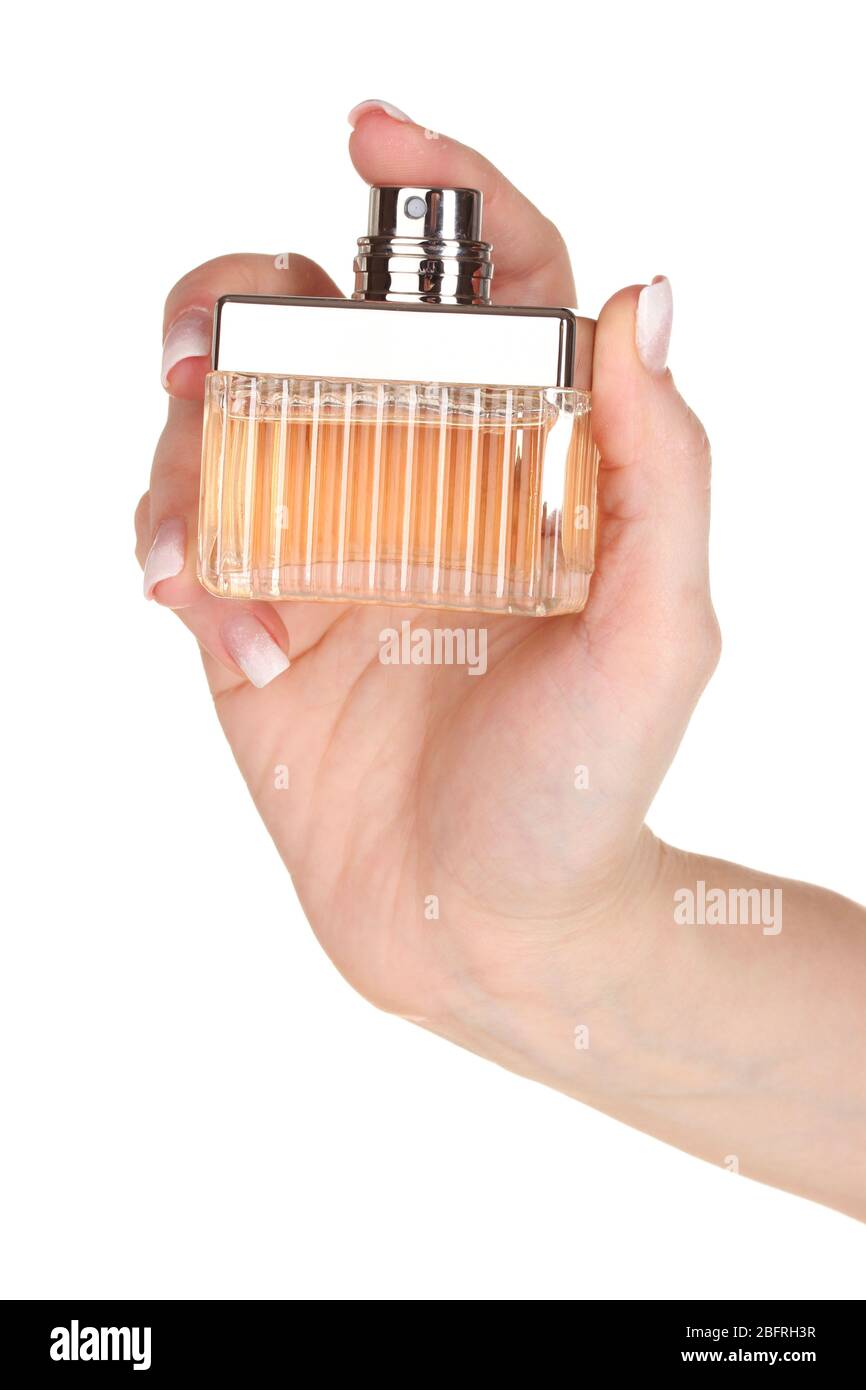women's hand and bottle of perfume isolated on white Stock Photo - Alamy