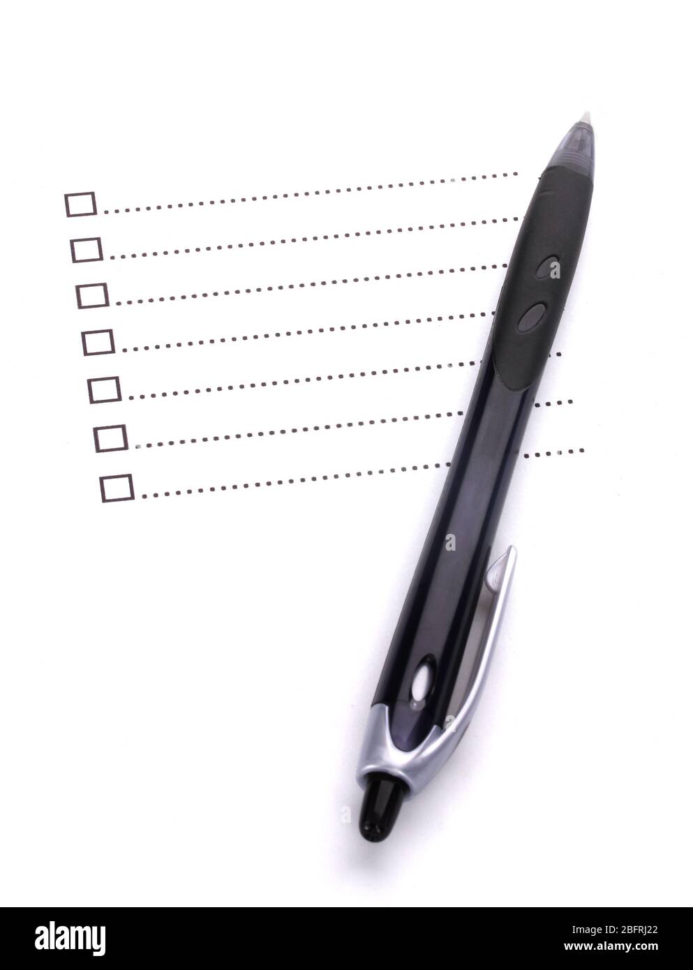Checklist and pen closeup Stock Photo - Alamy
