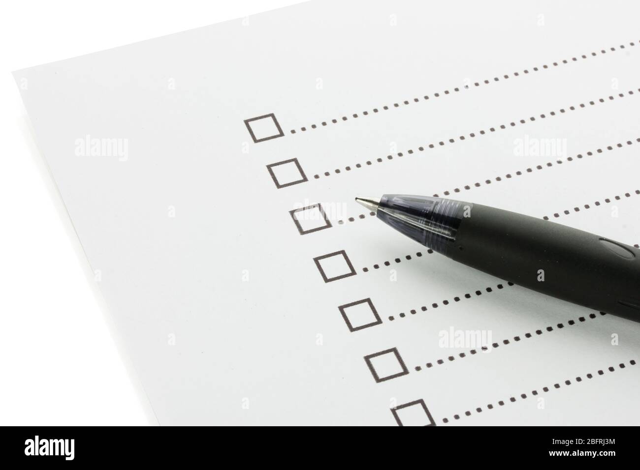 Checklist and pen closeup Stock Photo - Alamy