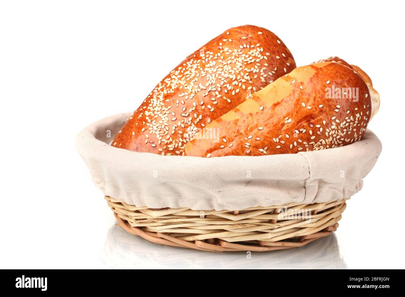 Baked bread in basket isolated on white Stock Photo - Alamy