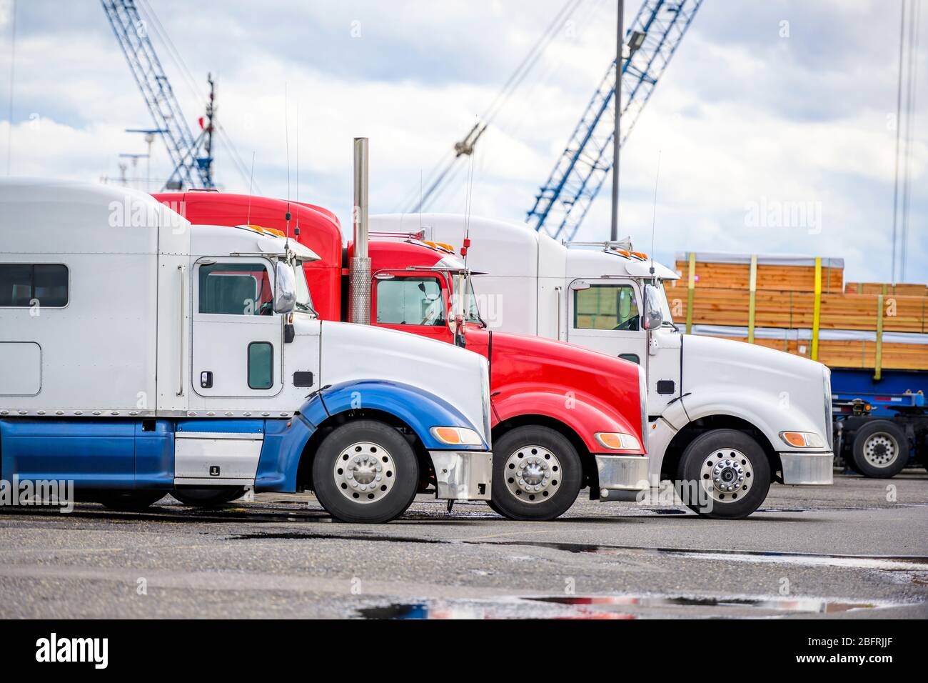 Powerful clean big rigs semi trucks tractors with high cab and rest ...