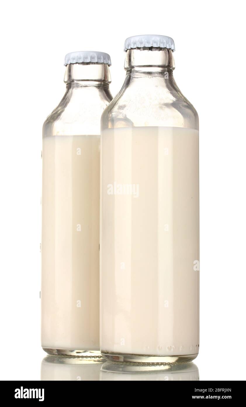 Two bottle of milk isolated on white Stock Photo - Alamy