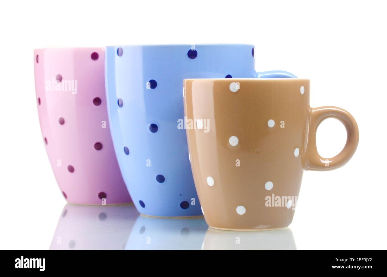 Color cups isolated on white Stock Photo - Alamy