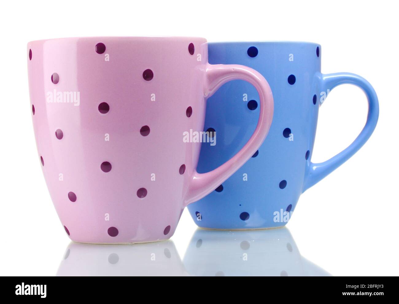 Two color cups isolated on white Stock Photo - Alamy