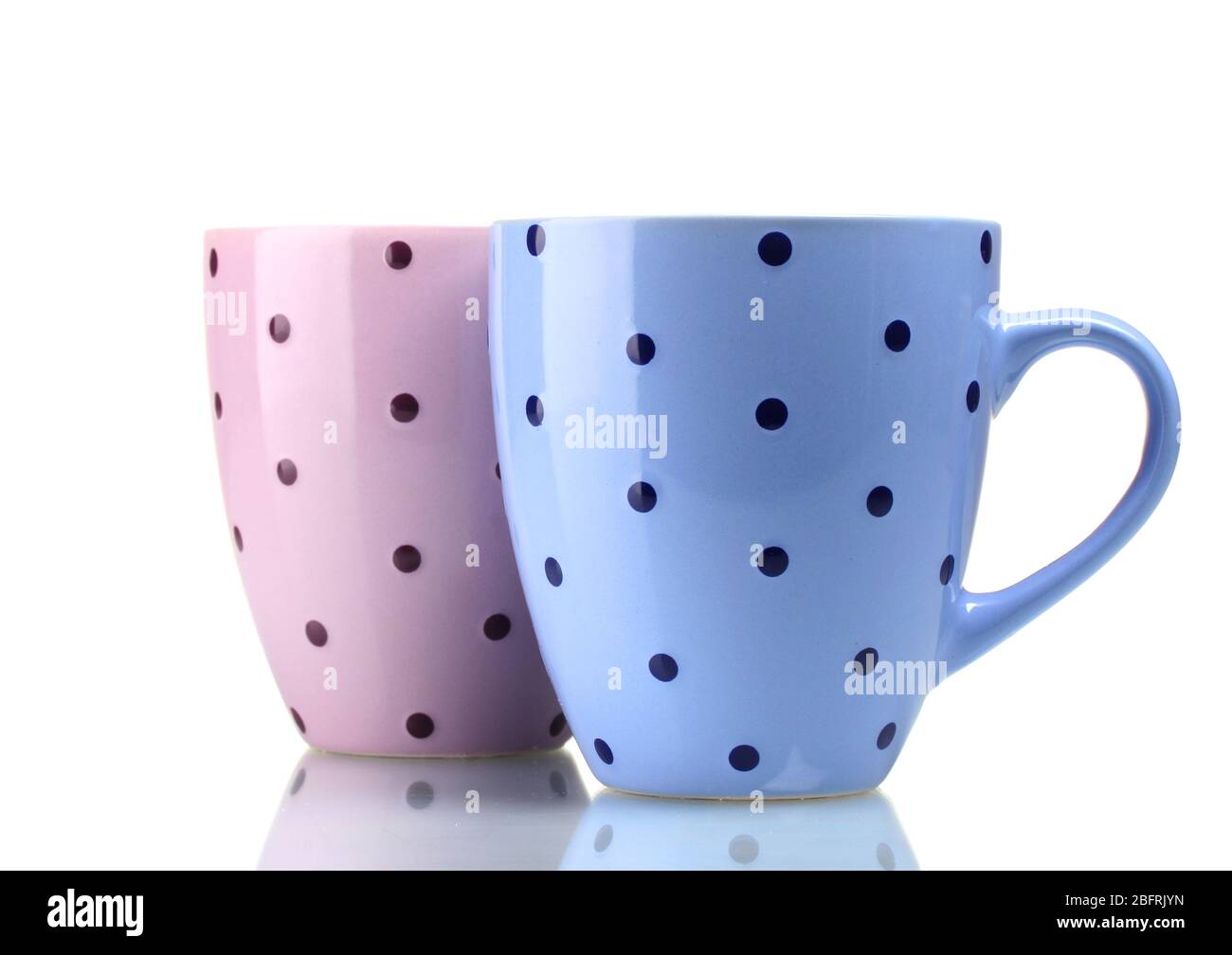Two color cups isolated on white Stock Photo - Alamy