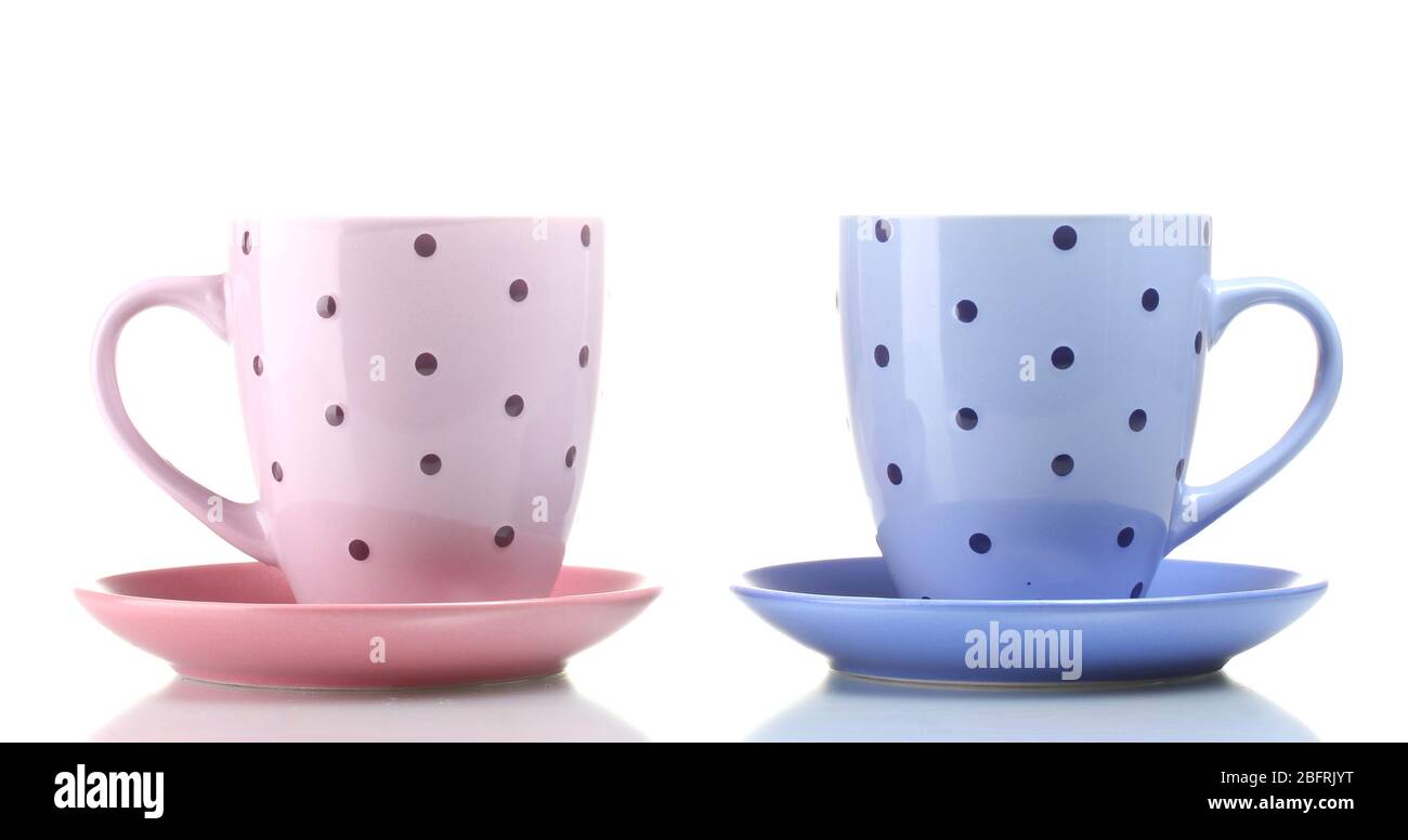 Two color cups isolated on white Stock Photo - Alamy