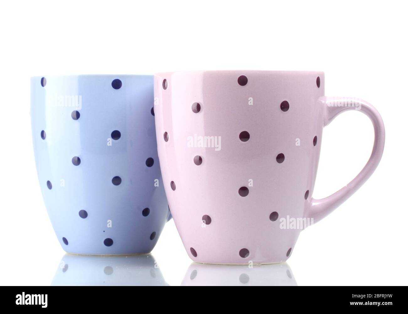 Two color cups isolated on white Stock Photo - Alamy