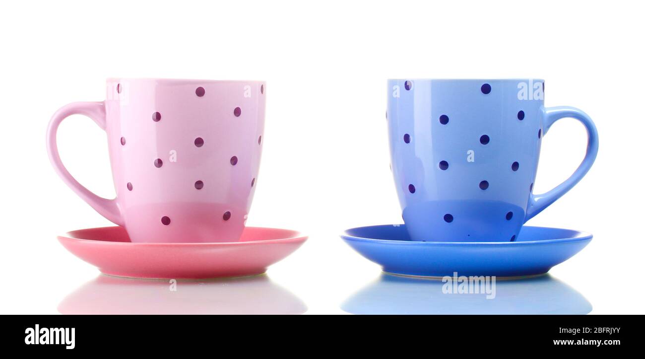 Two color cups isolated on white Stock Photo - Alamy