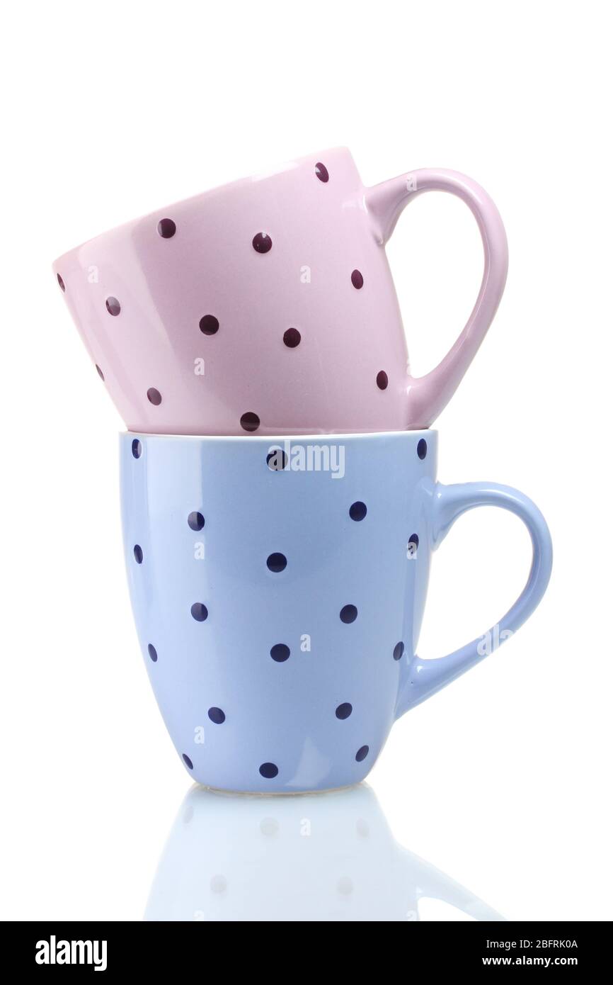 Two color cups isolated on white Stock Photo - Alamy