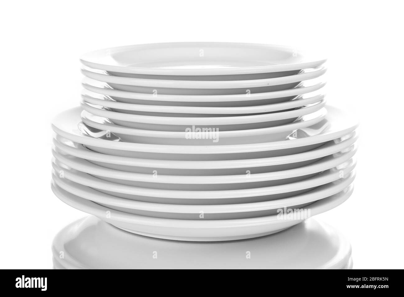 Clean plates isolated on white Stock Photo - Alamy