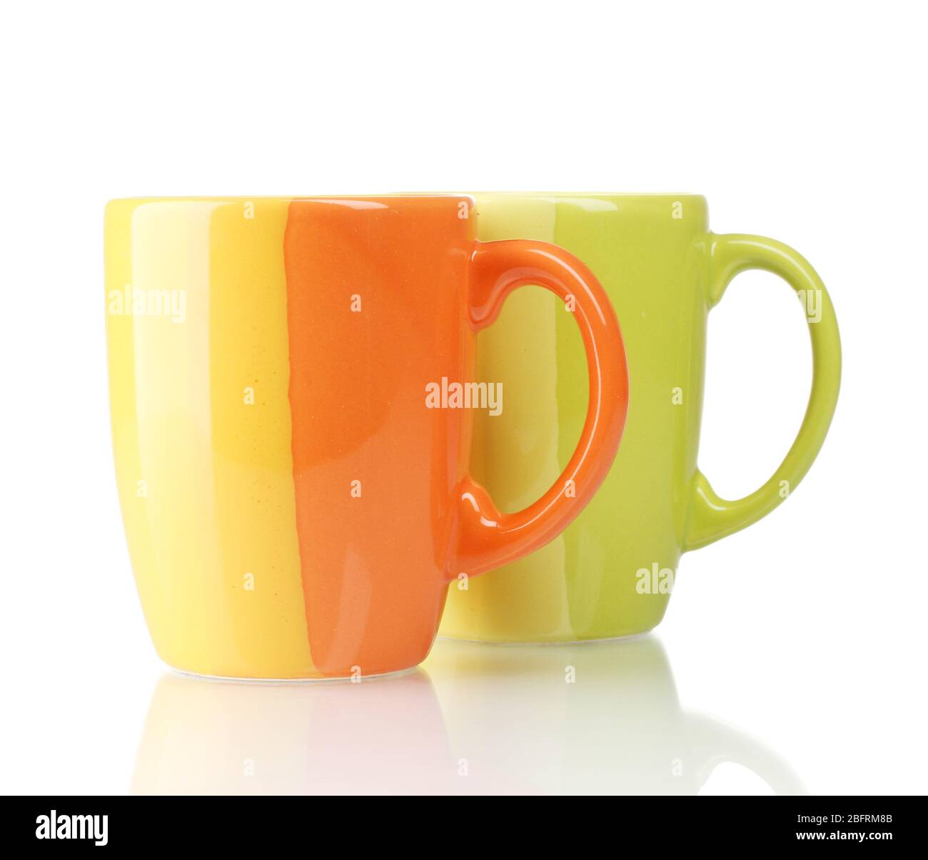 Two color cups isolated on white Stock Photo - Alamy