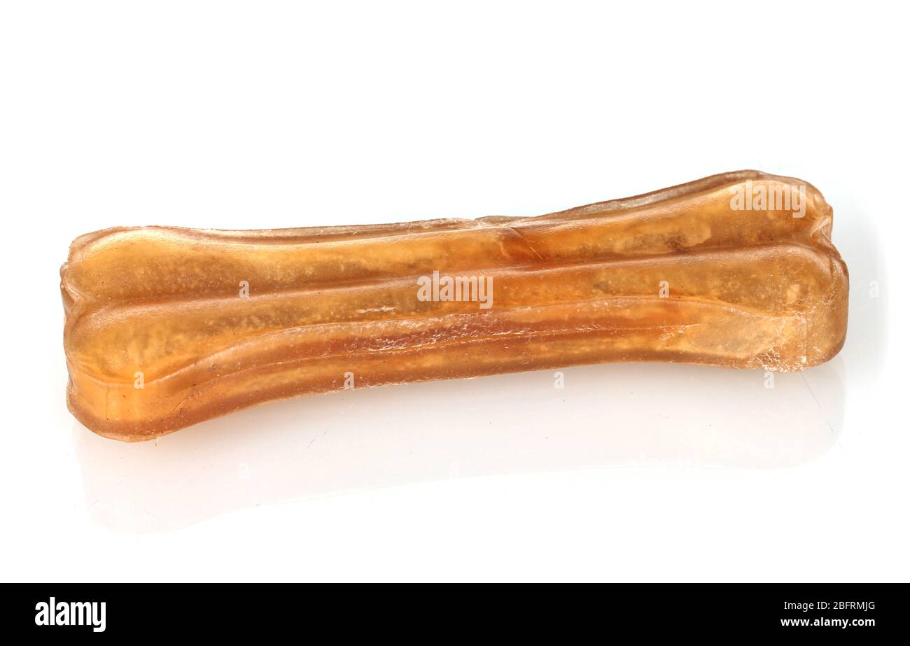 Dog bone isolated on white Stock Photo - Alamy