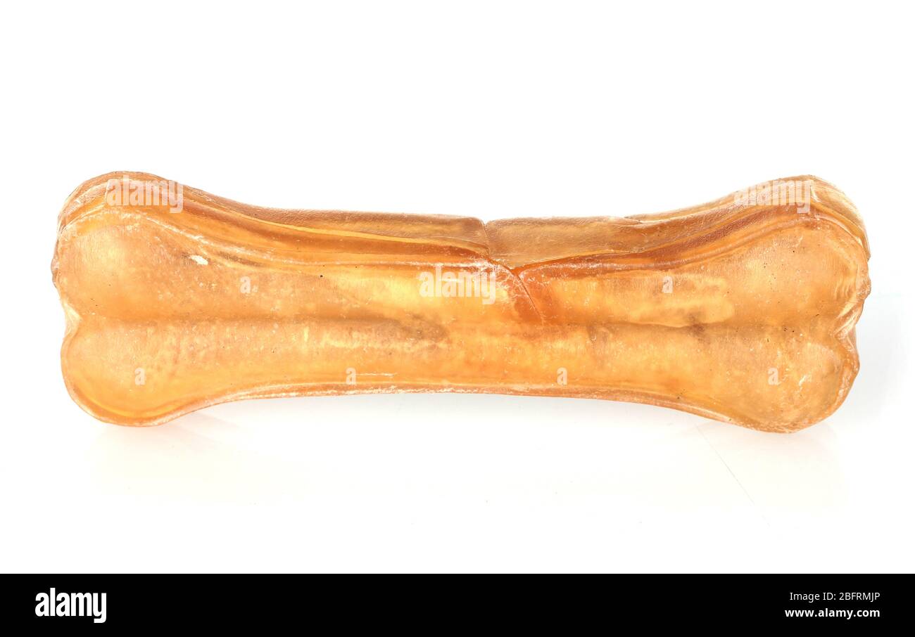 Dog bone isolated on white Stock Photo - Alamy