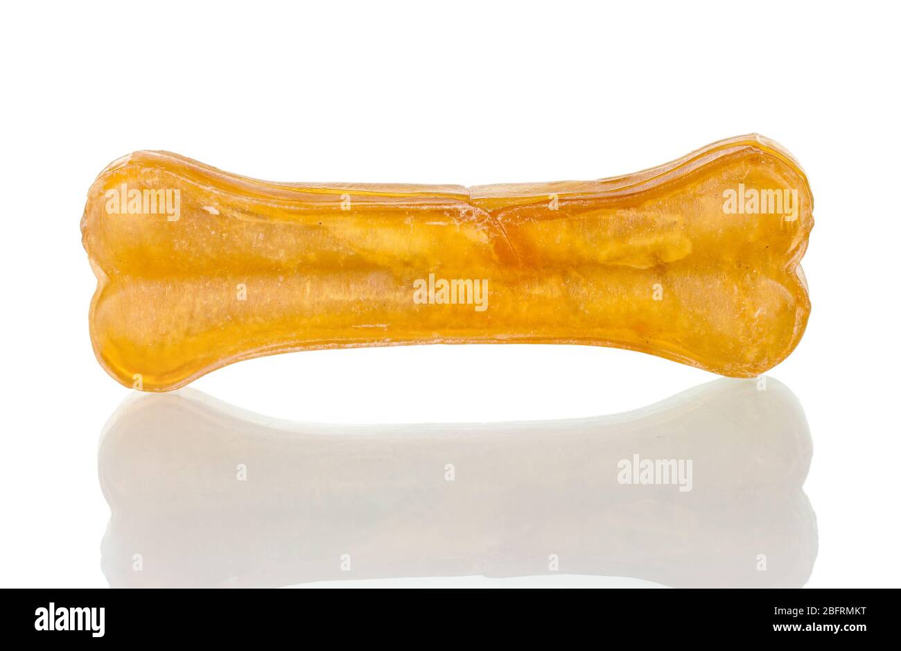 Dog bone isolated on white Stock Photo - Alamy
