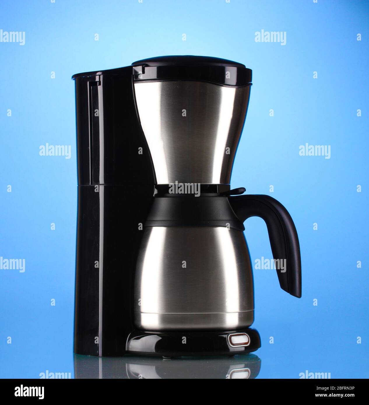 Coffee maker on blue background Stock Photo - Alamy