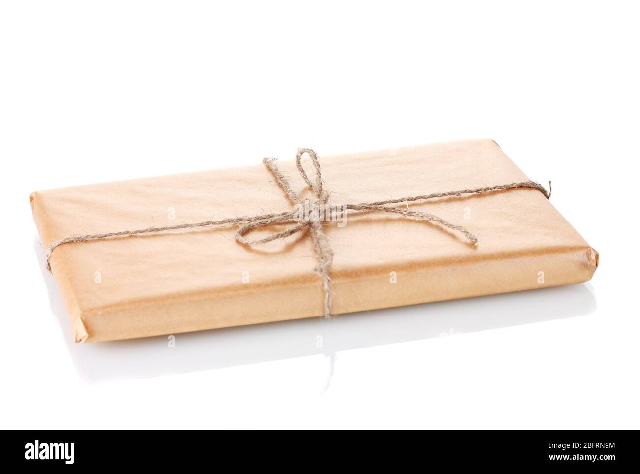 Parcel wrapped in brown paper and string Cut Out Stock Images ...