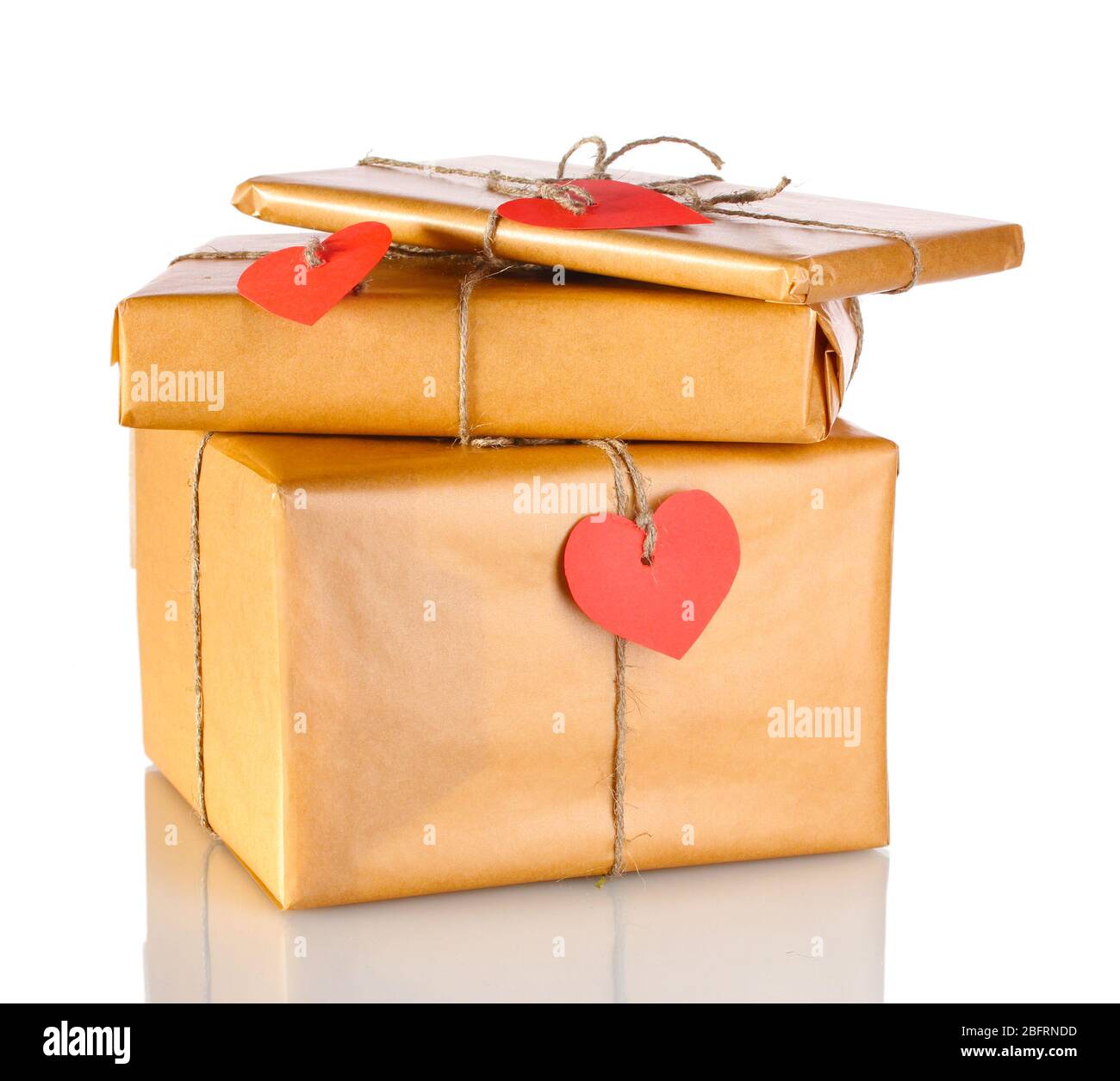 Three parcels with blank heart-shaped labels isolated on white Stock ...