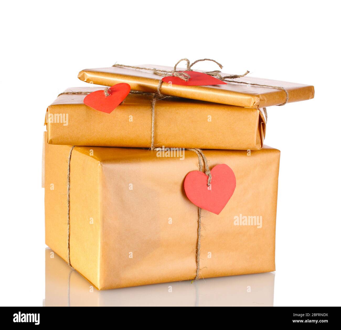 Three parcels with blank heart-shaped labels isolated on white Stock ...