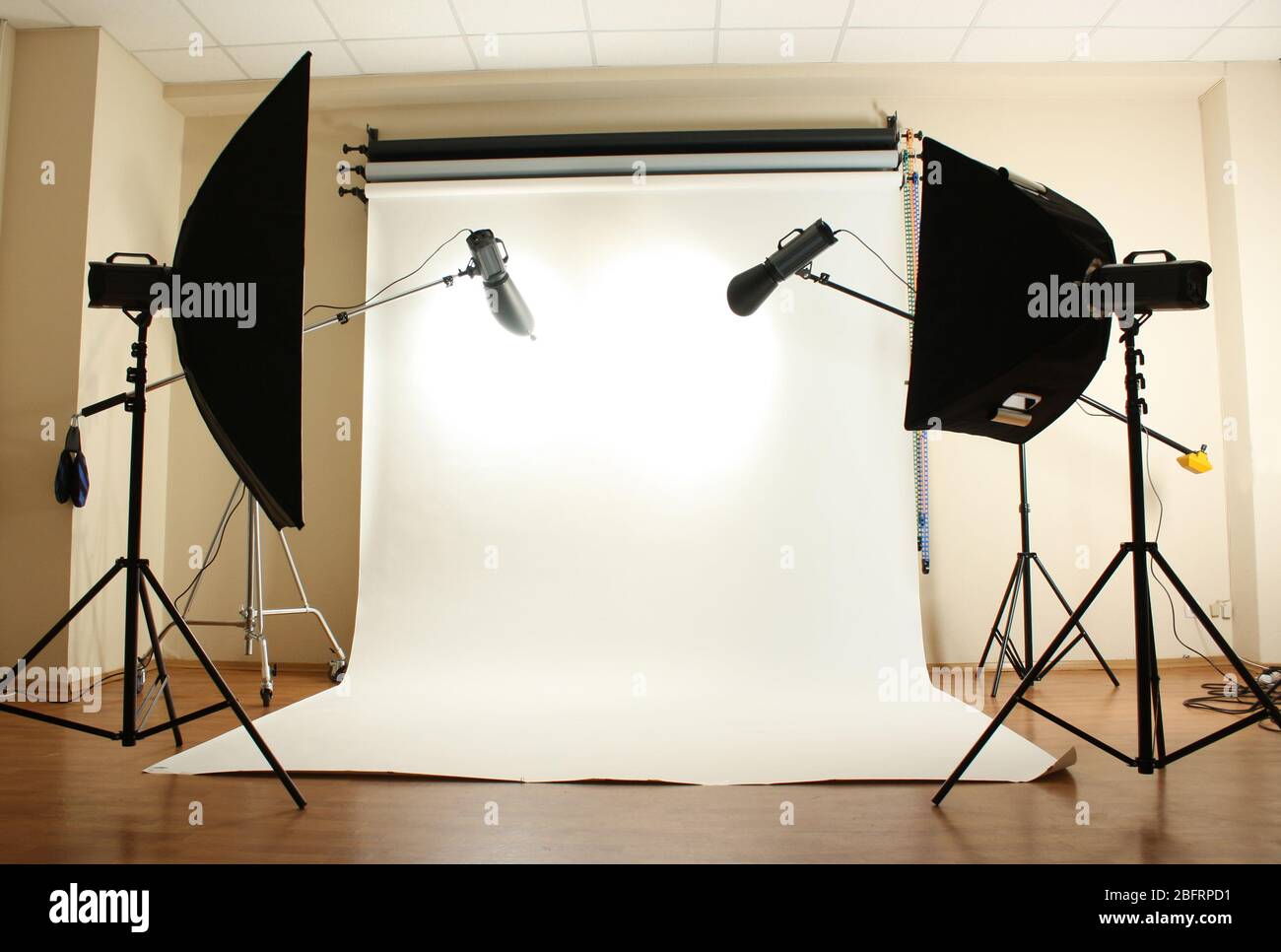 Empty photo studio with lighting equipment Stock Photo - Alamy