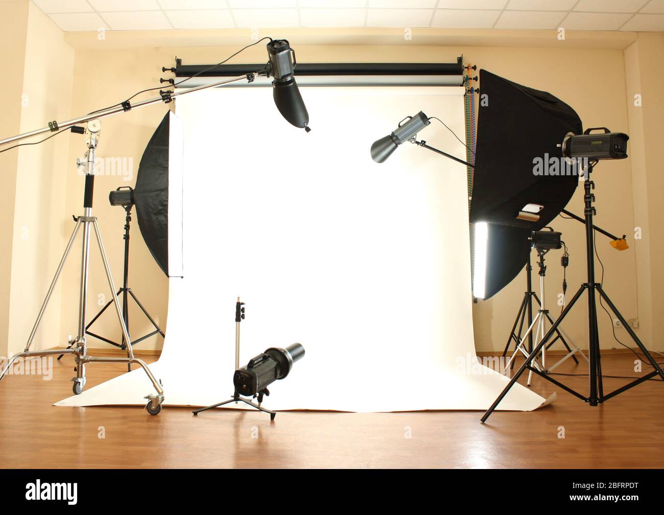 Empty photo studio with lighting equipment Stock Photo - Alamy