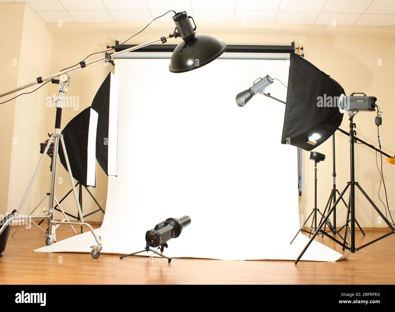 Empty photo studio with lighting equipment Stock Photo - Alamy