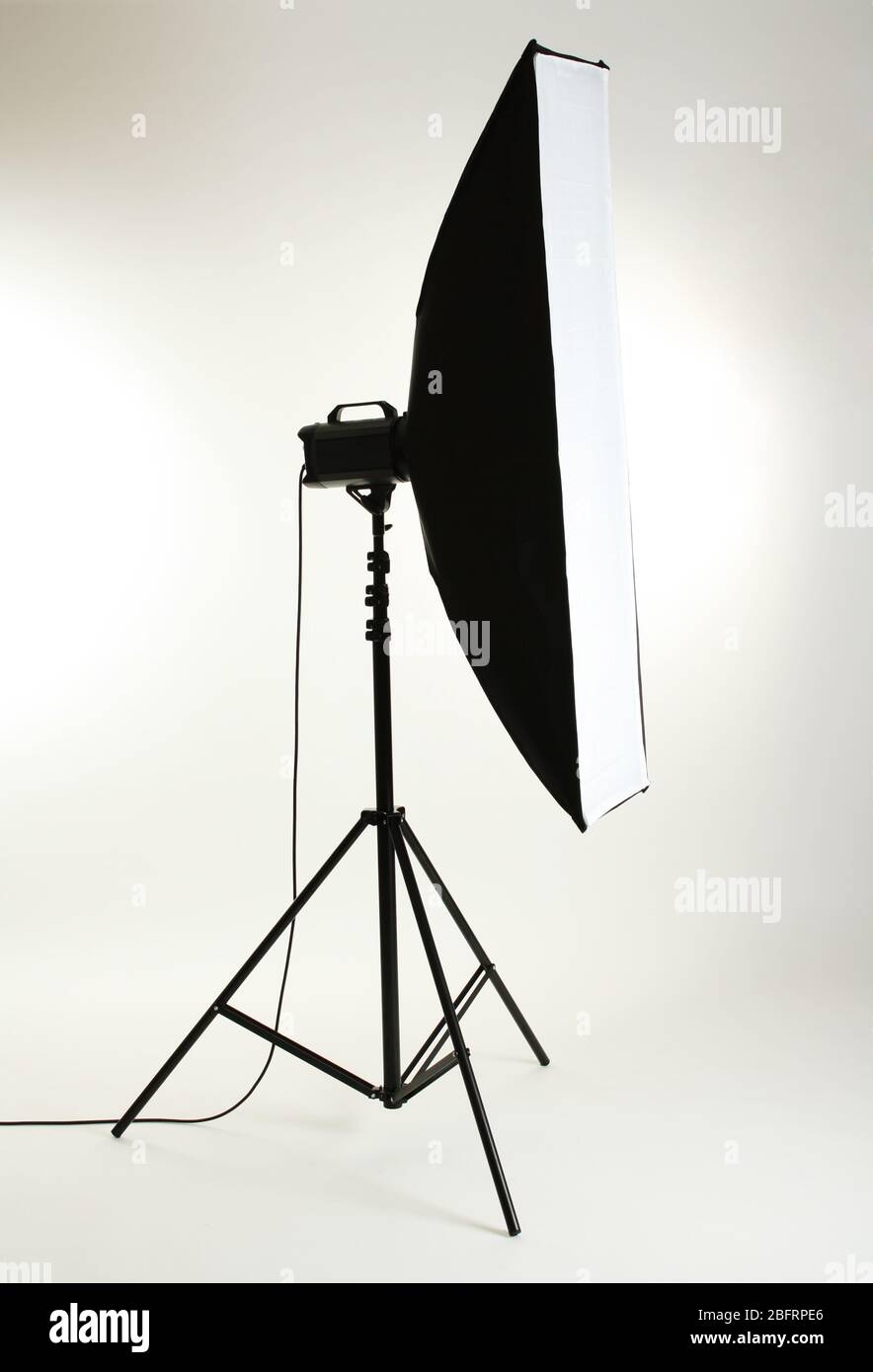 Studio flash with soft-box on white background Stock Photo - Alamy